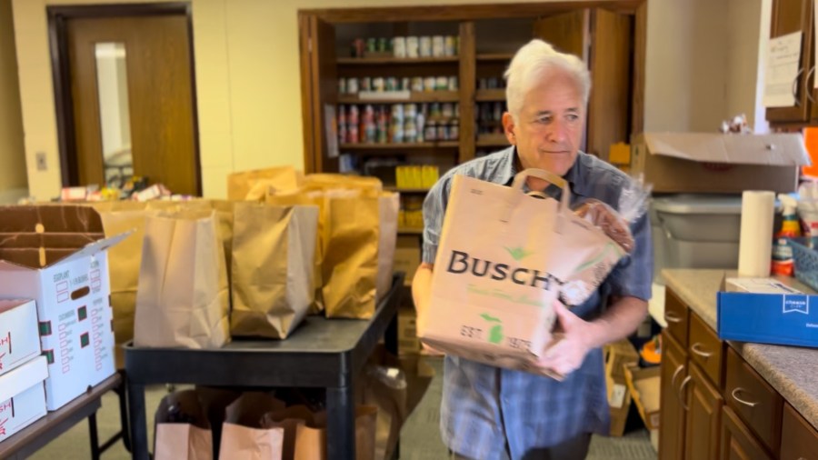 ‘Neighbors helping neighbors’: Football Frenzy Tailgate food drive ...