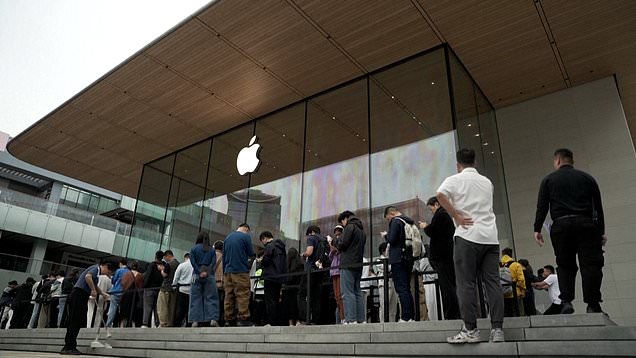 People are still queuing up to drop up to £1,999 for the new iPhone 17
