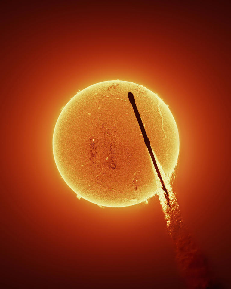 Falcon-9 cuts across the Sun in a daring once-in-a-lifetime photograph