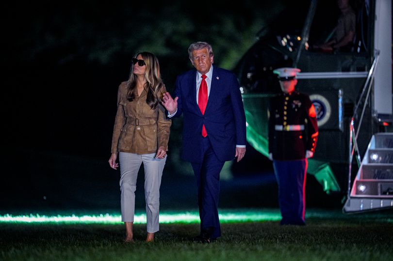 Trump accused of using Melania as 'human walker' as he staggers into ...