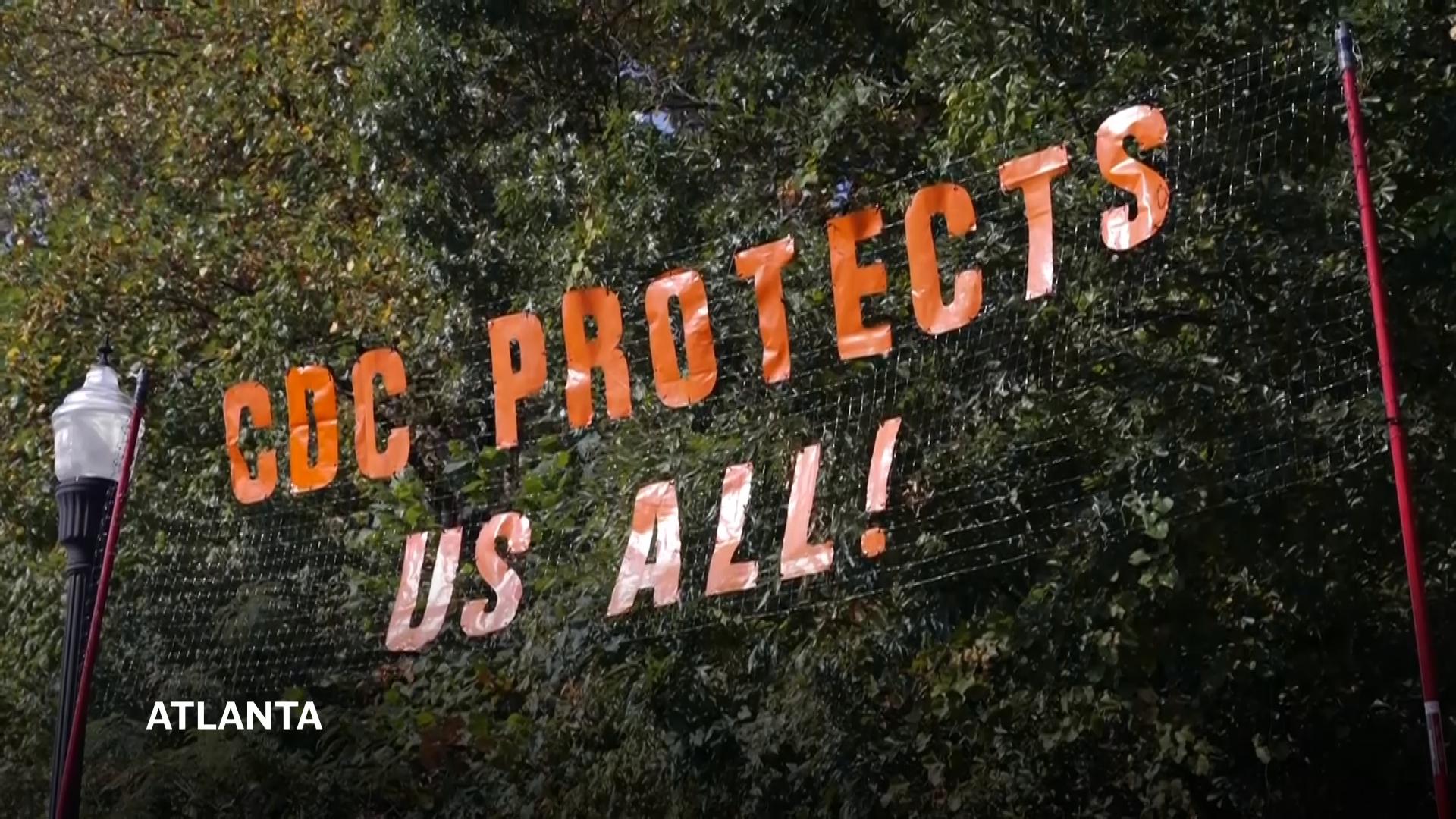 Retired CDC employees protest outside meeting of Health Secretary's ...