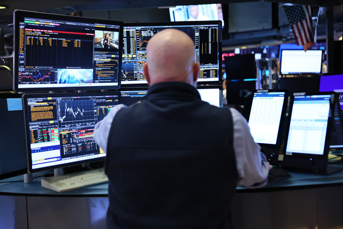 Stock market today: Dow, Russell 2000 jump; Nasdaq falls as Fed ...