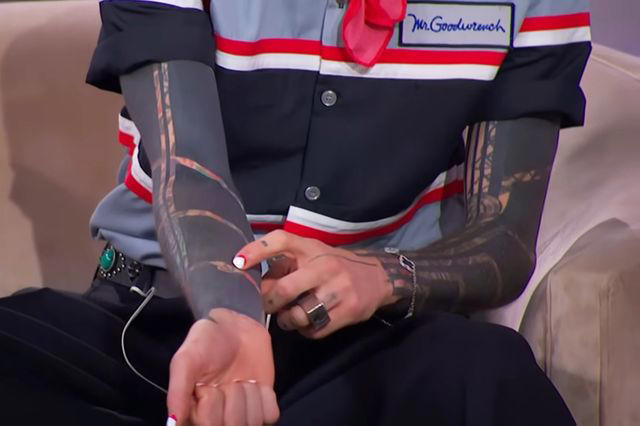 MGK Reveals the Story Behind His Massive Blackout Tattoo — and How ...