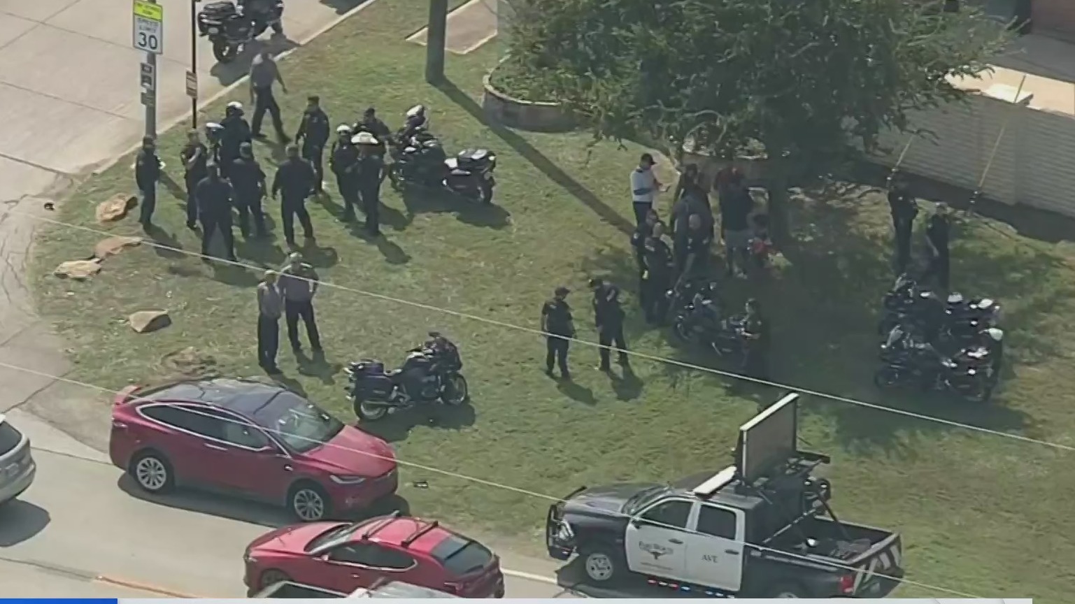Officer hospitalized after crash during procession for late Hurst chief