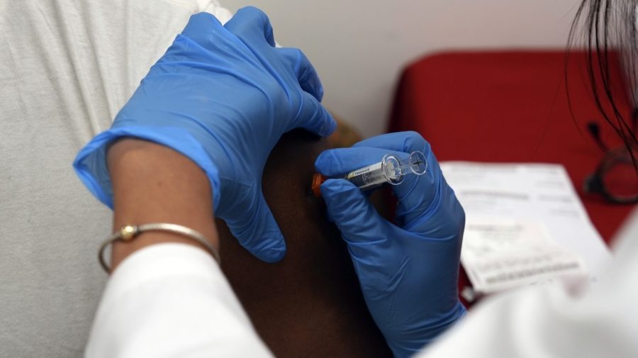 CDC vaccine panel votes to change COVID-19 vaccine guidance