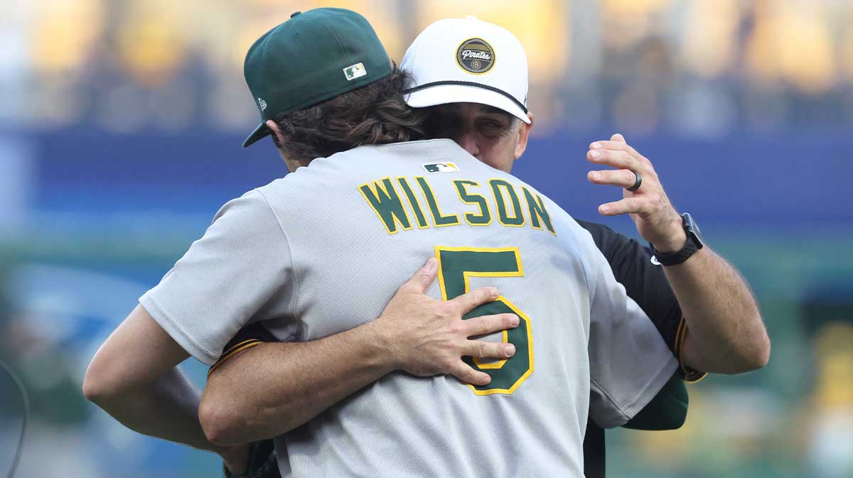 Athletics’ Jacob Wilson catches opening pitch from father Jack in full ...