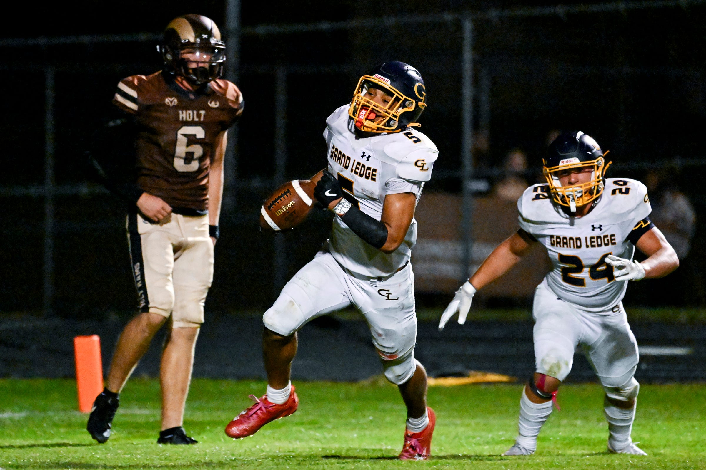 Anthony Baker delivers for Grand Ledge football in comeback victory over Holt