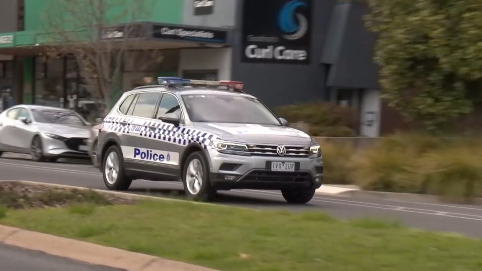 Heavily-armed police swoop on home in their hunt for accused cop killer