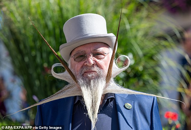 The winner - by a whisker! Gentlemen show off incredible chin hair at ...