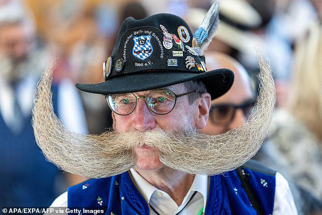 The winner - by a whisker! Gentlemen show off incredible chin hair at ...