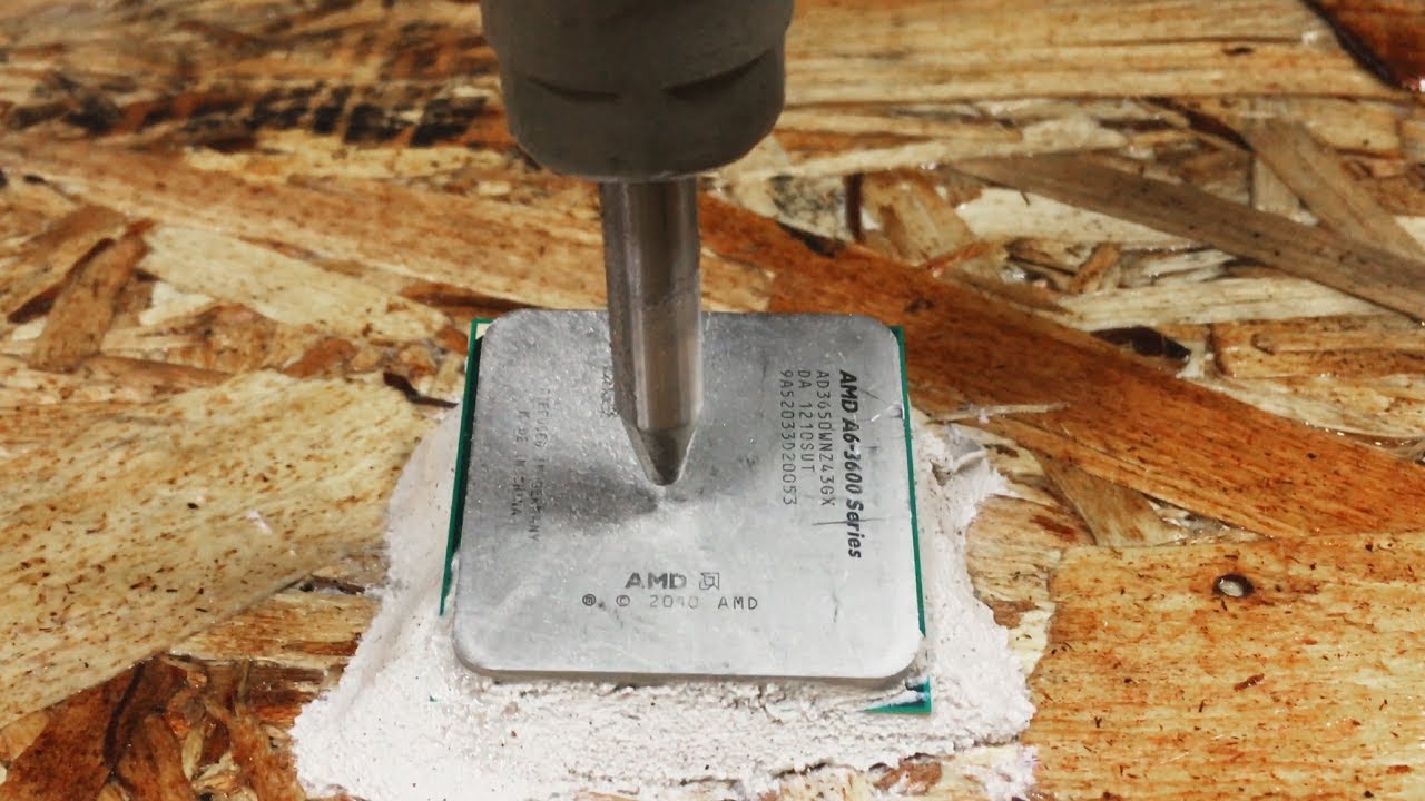 Inside a computer processor with a 60,000 PSI waterjet - AMD CPU cut in ...