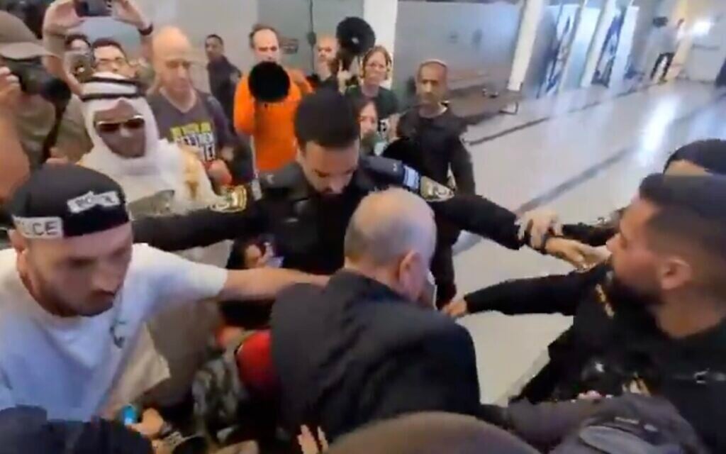 Court releases man arrested for throwing mock bills at Likud MK