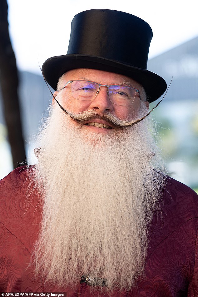 The winner - by a whisker! Gentlemen show off incredible chin hair at ...