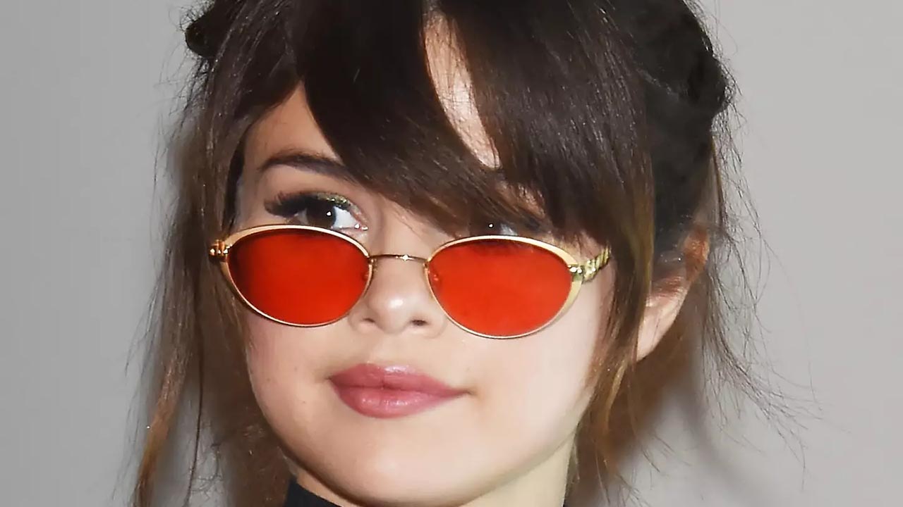Here's Why You See So Many Celebrities Wearing Red Lens Glasses