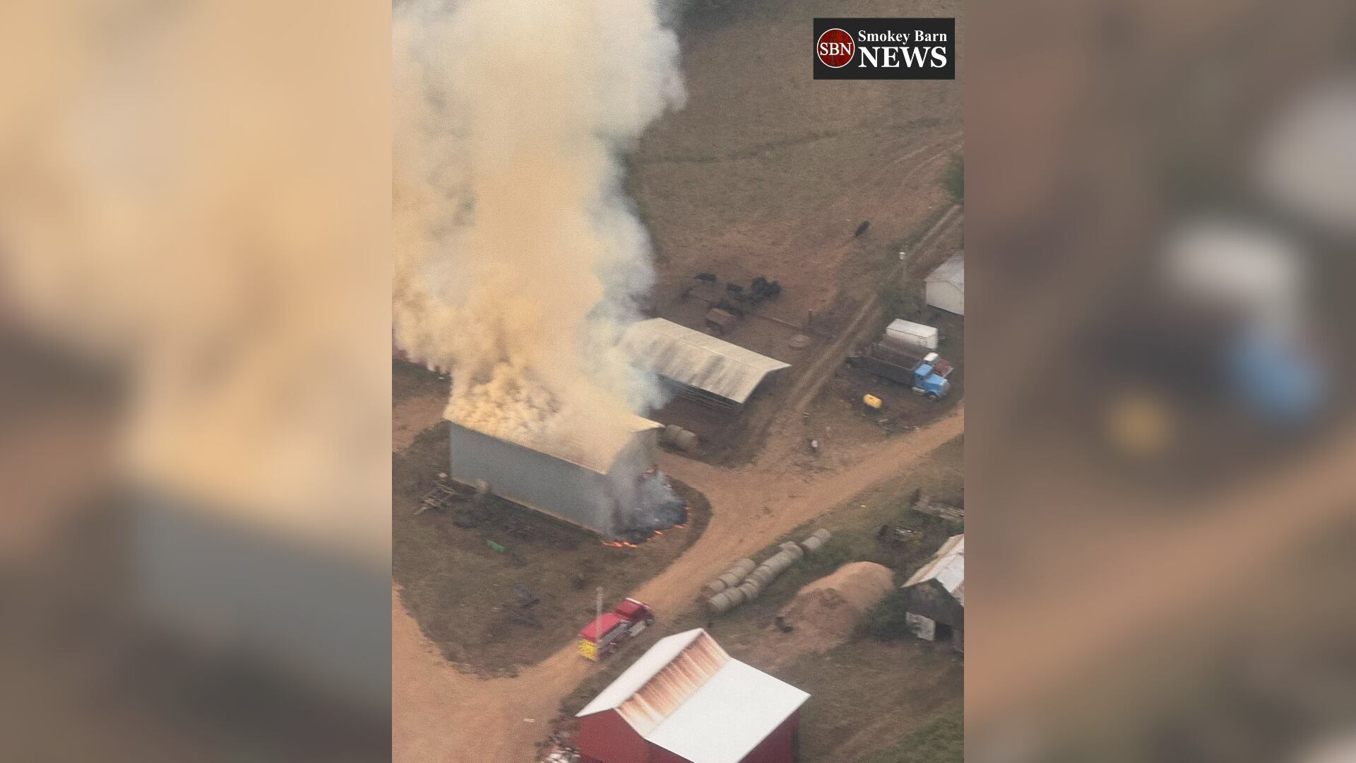 Crews fighting tobacco barn fire in White House