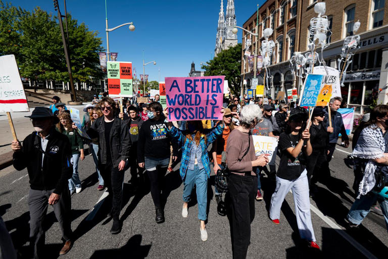 Thousands rally in Toronto to 'draw the line' against PM Carney agenda