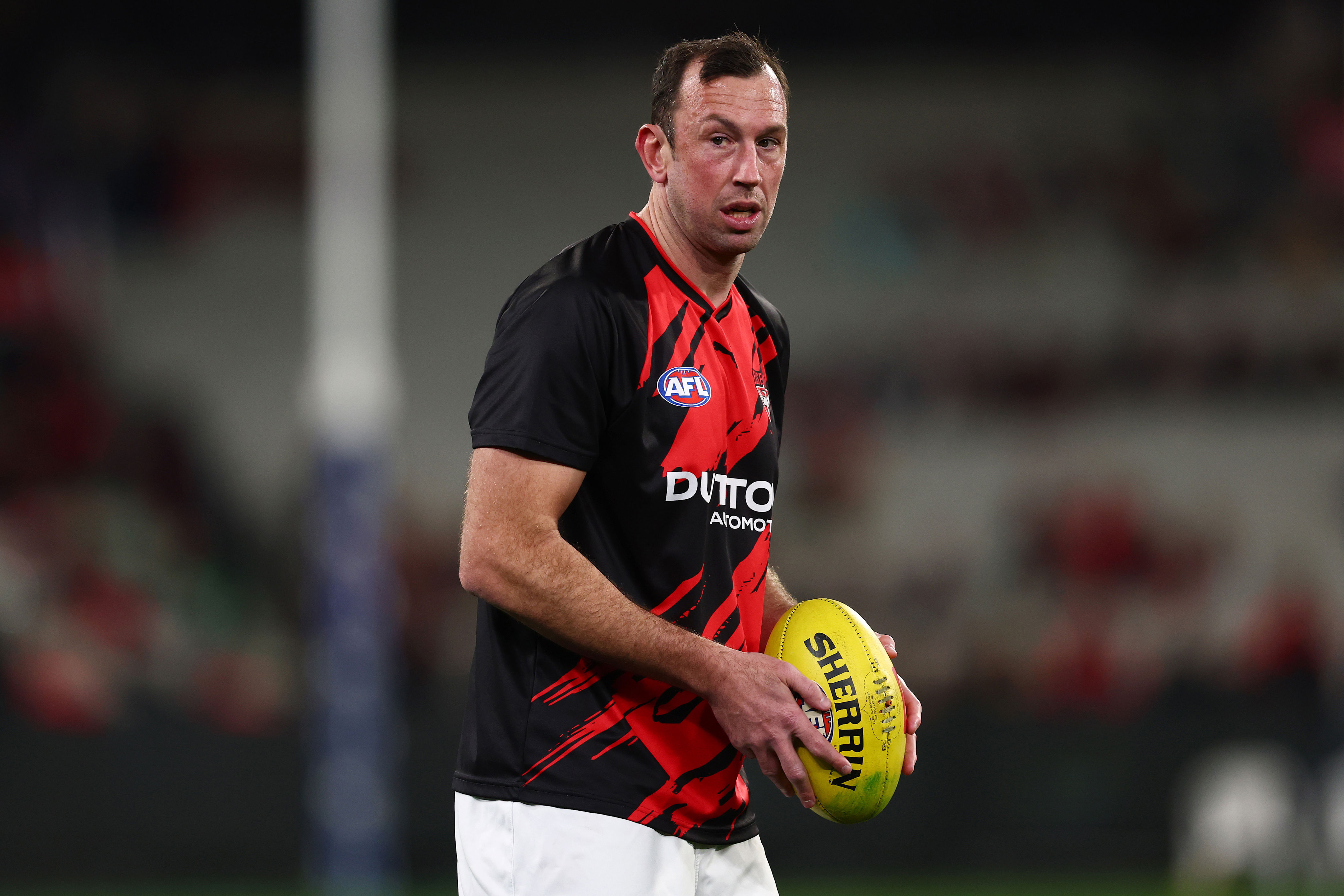 Essendon cuts veteran pair amid list turnover chaos