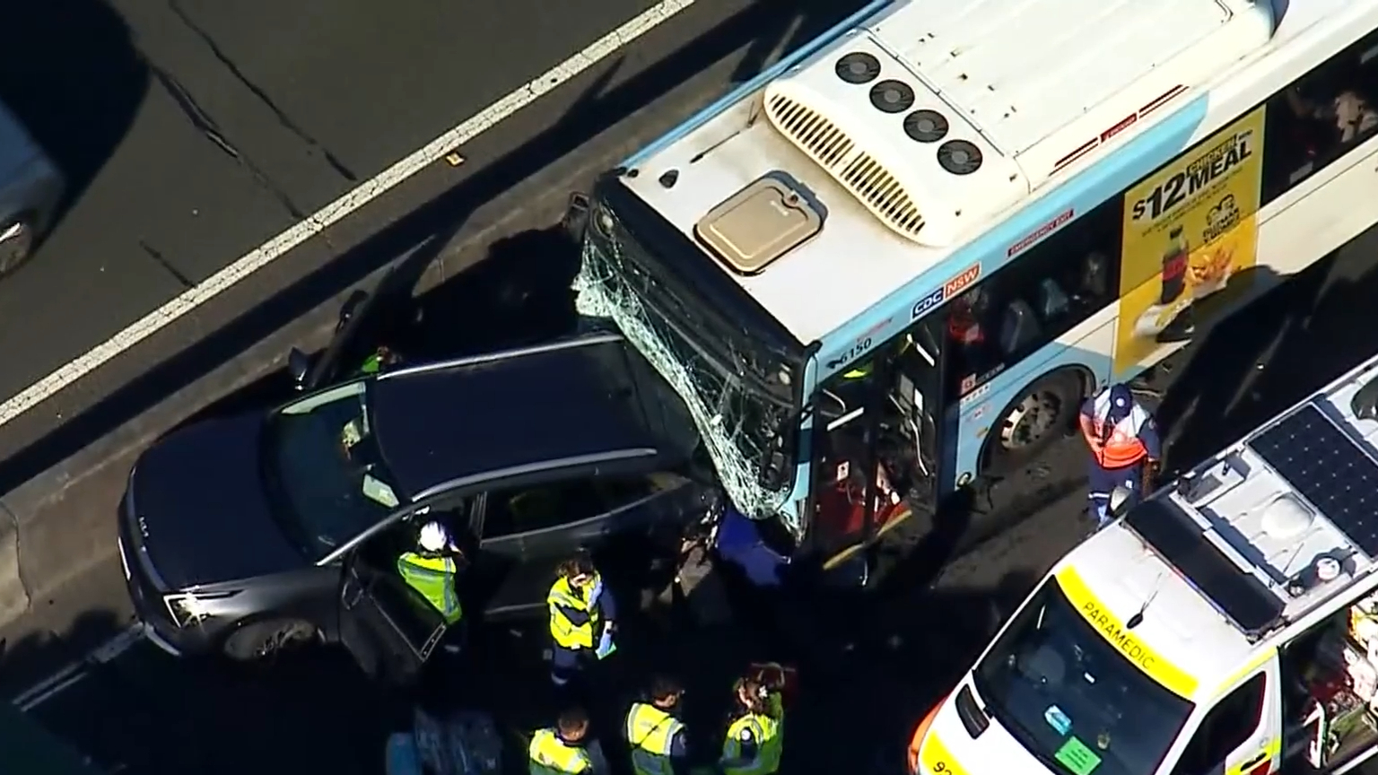 Bus driver left trapped, multiple injured after crash between bus and car