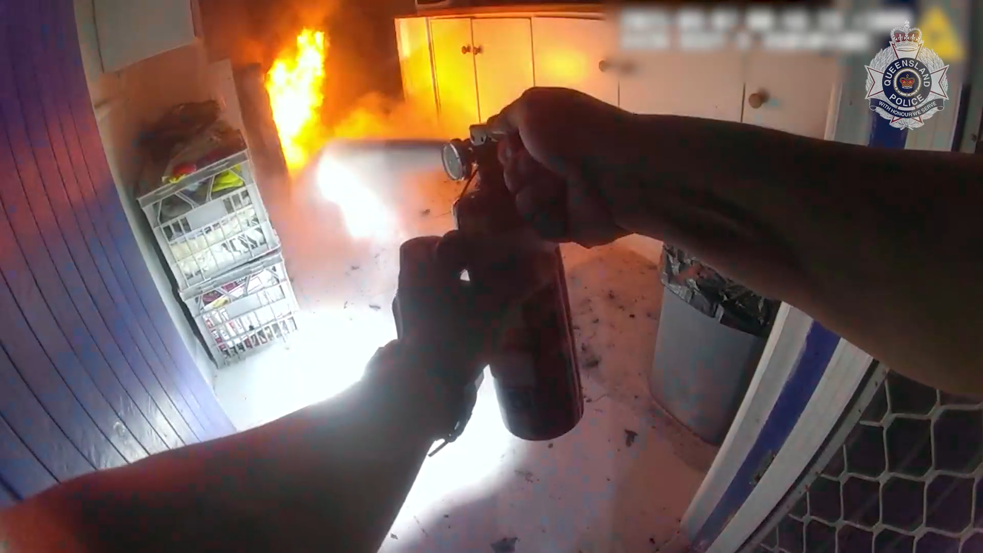 Officers rescue elderly woman in wheelchair from burning home
