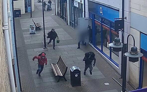 Gang of masked phone thieves caught red-handed during violent raid on ...