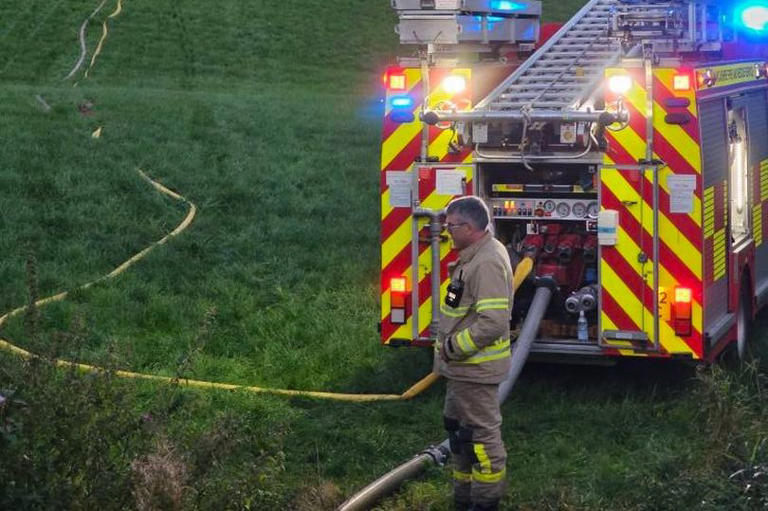 Eight fire engines battle huge blaze using water pumped from river ...