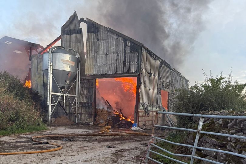 Eight fire engines battle huge blaze using water pumped from river ...