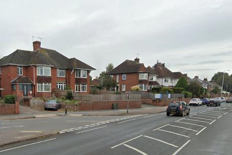 Injured driver arrested after car smashes into parked vehicles in Exeter