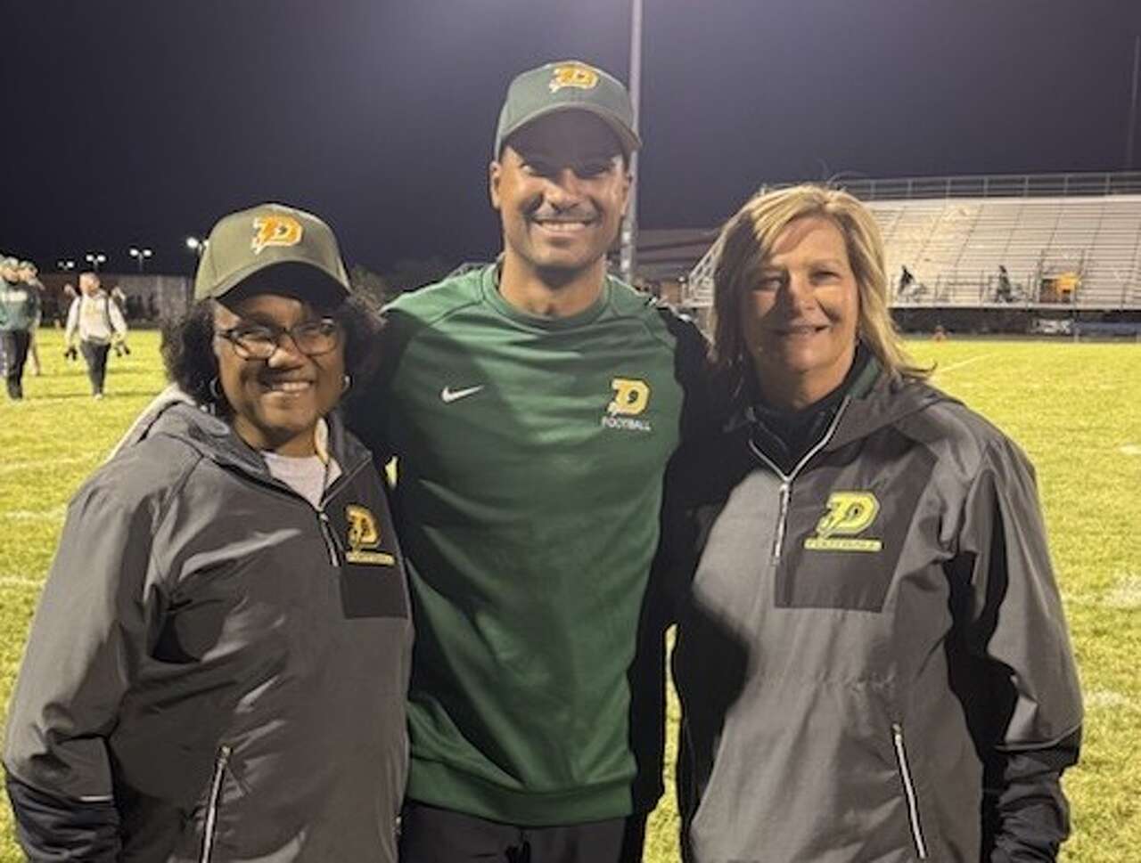 For love of the game, and family: Two moms keep Dow football stats