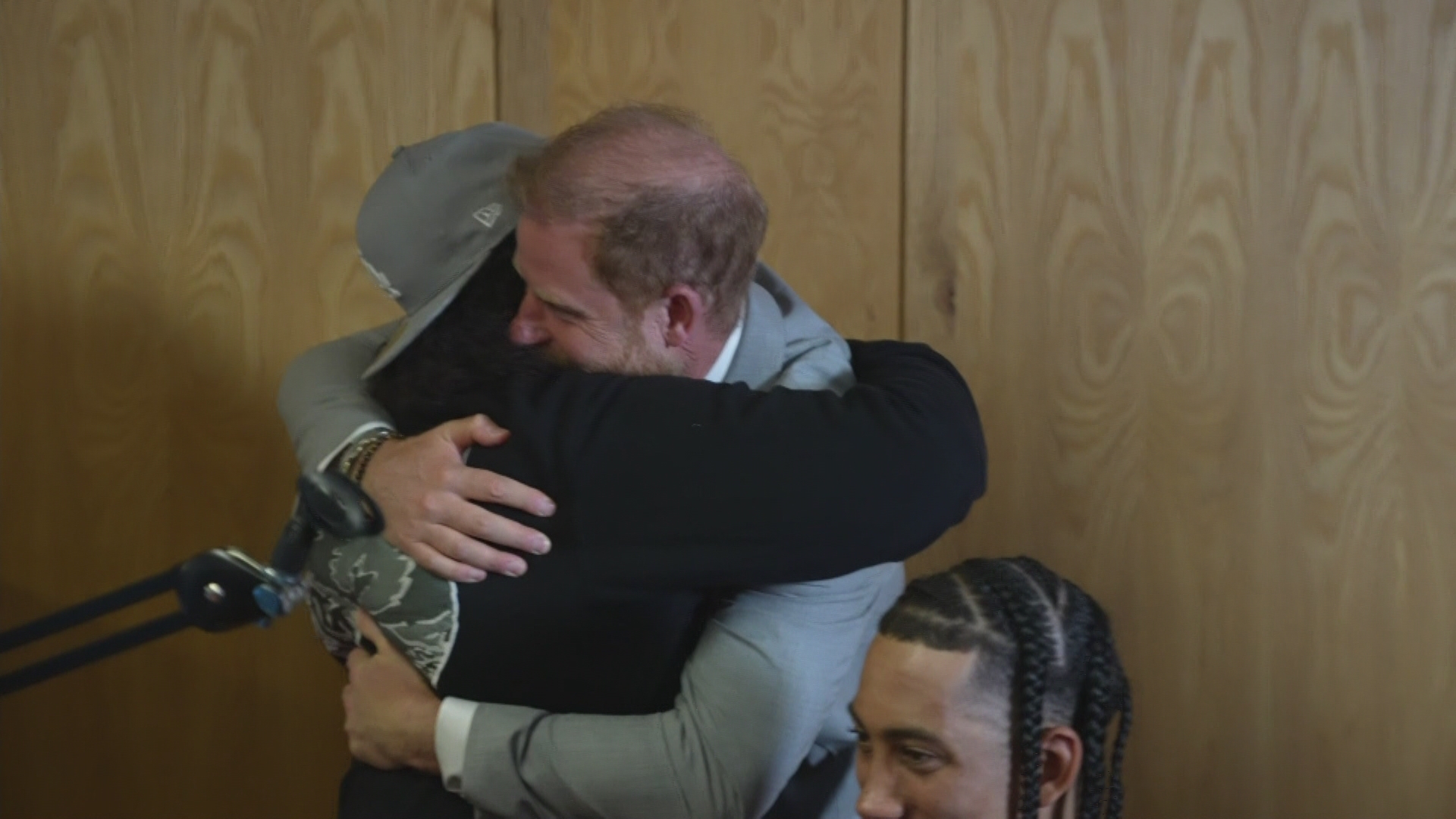 Local artist gets a 'wow' and a hug from Prince Harry