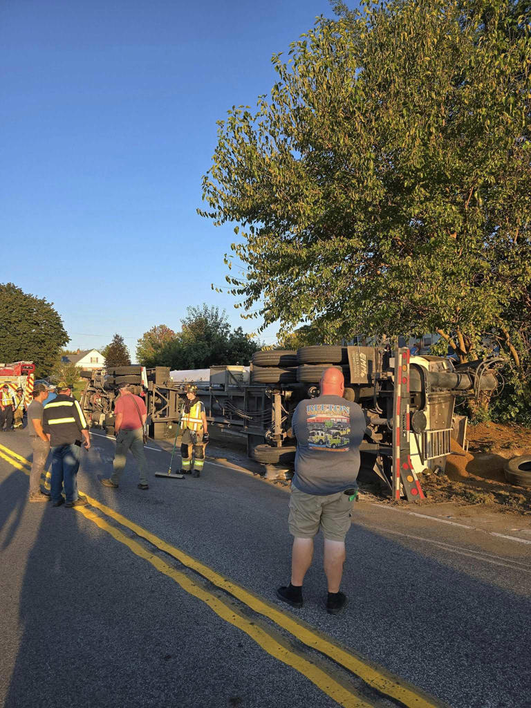 Neighbor breaks windshield to rescue driver after tanker truck ...