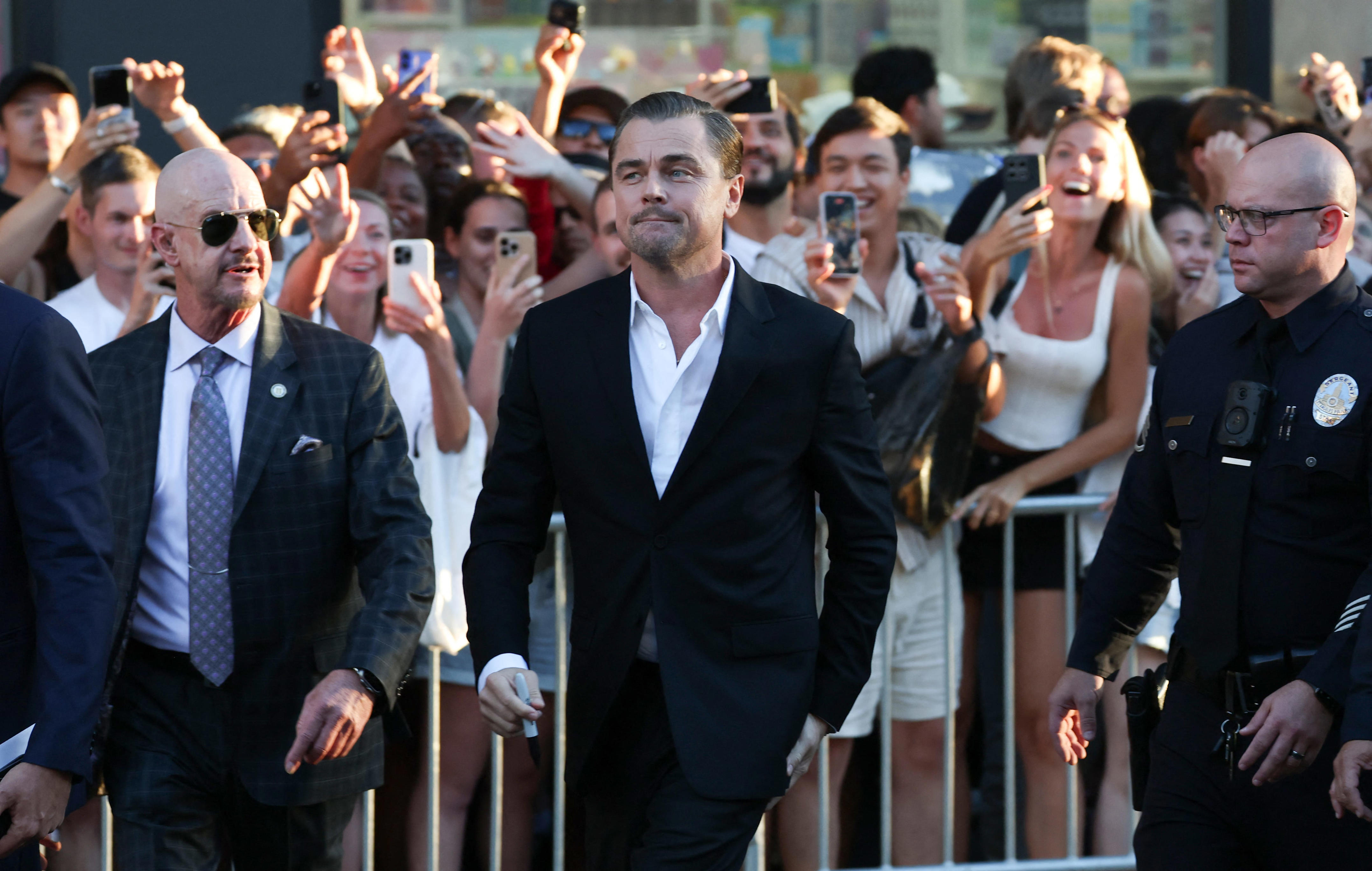 Leonardo DiCaprio walks 'One Battle' premiere red carpet solo, wishes ...
