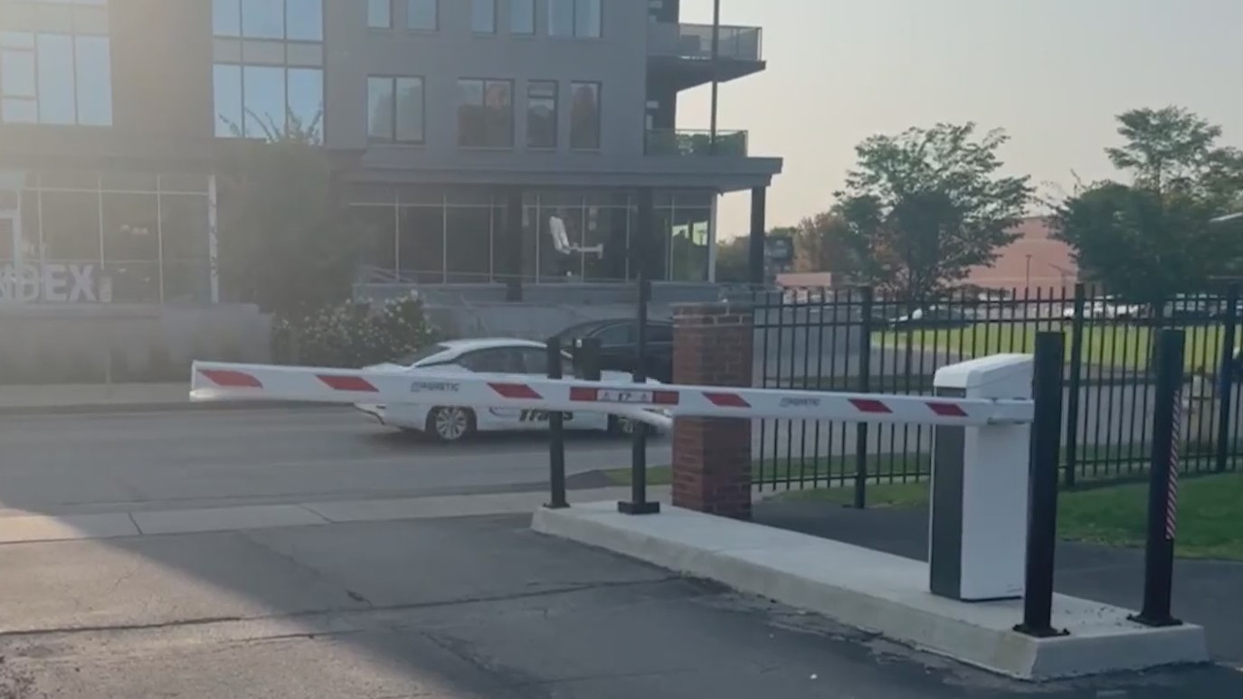 Multiple cars smashed, gate broken at Normandie Apt.