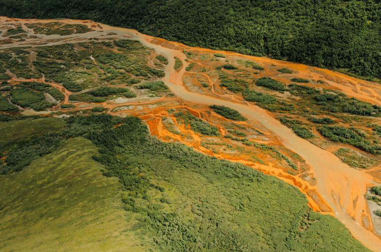 Orange rivers signal toxic shift in Arctic wilderness