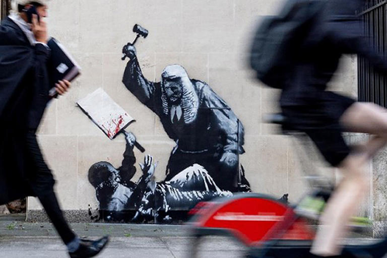 Banksy artwork erased from Royal Courts of Justice as Elon Musk wades ...