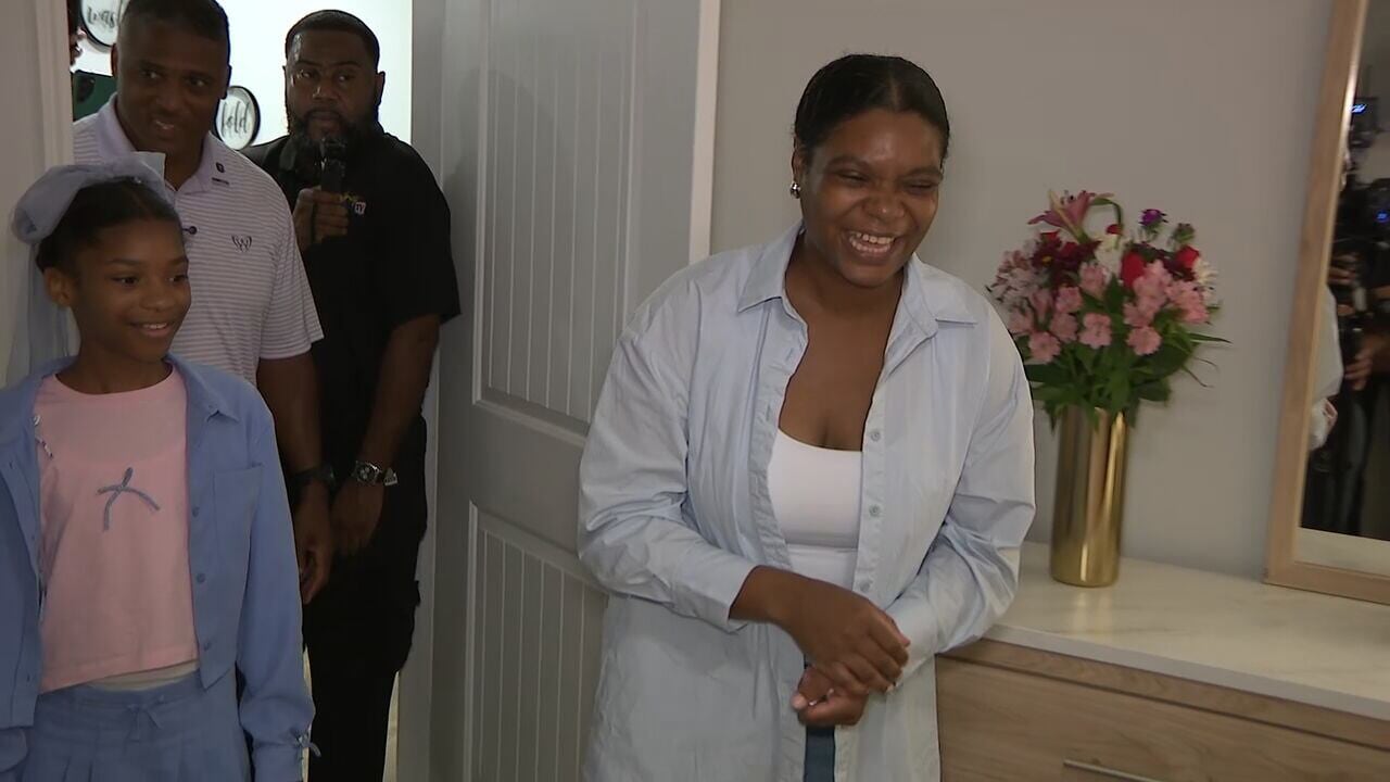 Atlanta Falcons legend Warrick Dunn surprises families by furnishing ...