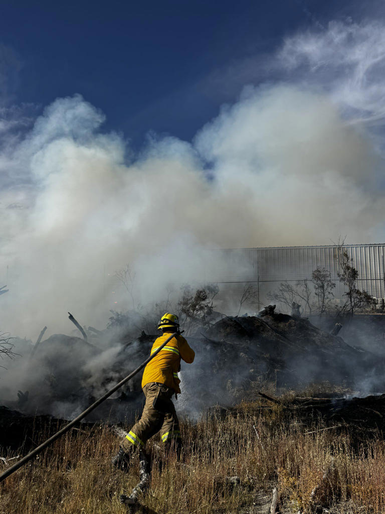Grass fire east of SR-201 and I-215 interchange under control