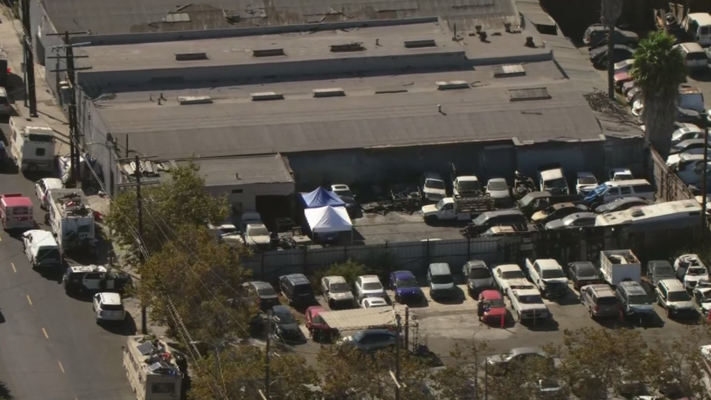 Woman arrested for murder after police find body in South LA tow yard