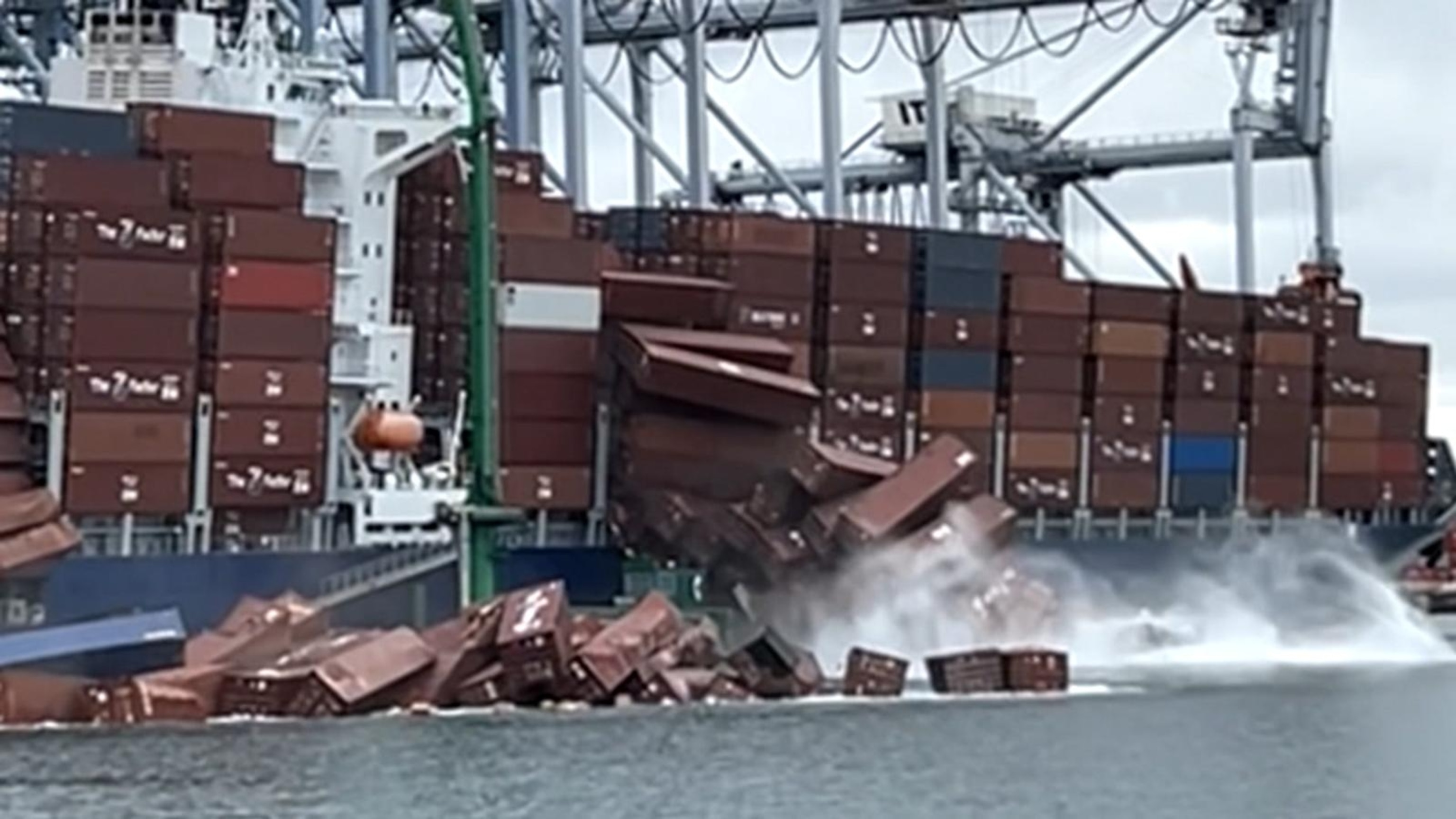 Operations suspended at California port after cargo containers tumble ...