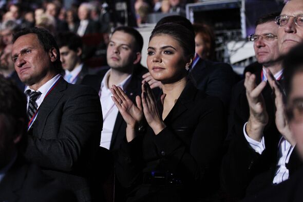 Vladimir Putin debuts 'new Tsarina' former Olympic gymnast with 30 year ...