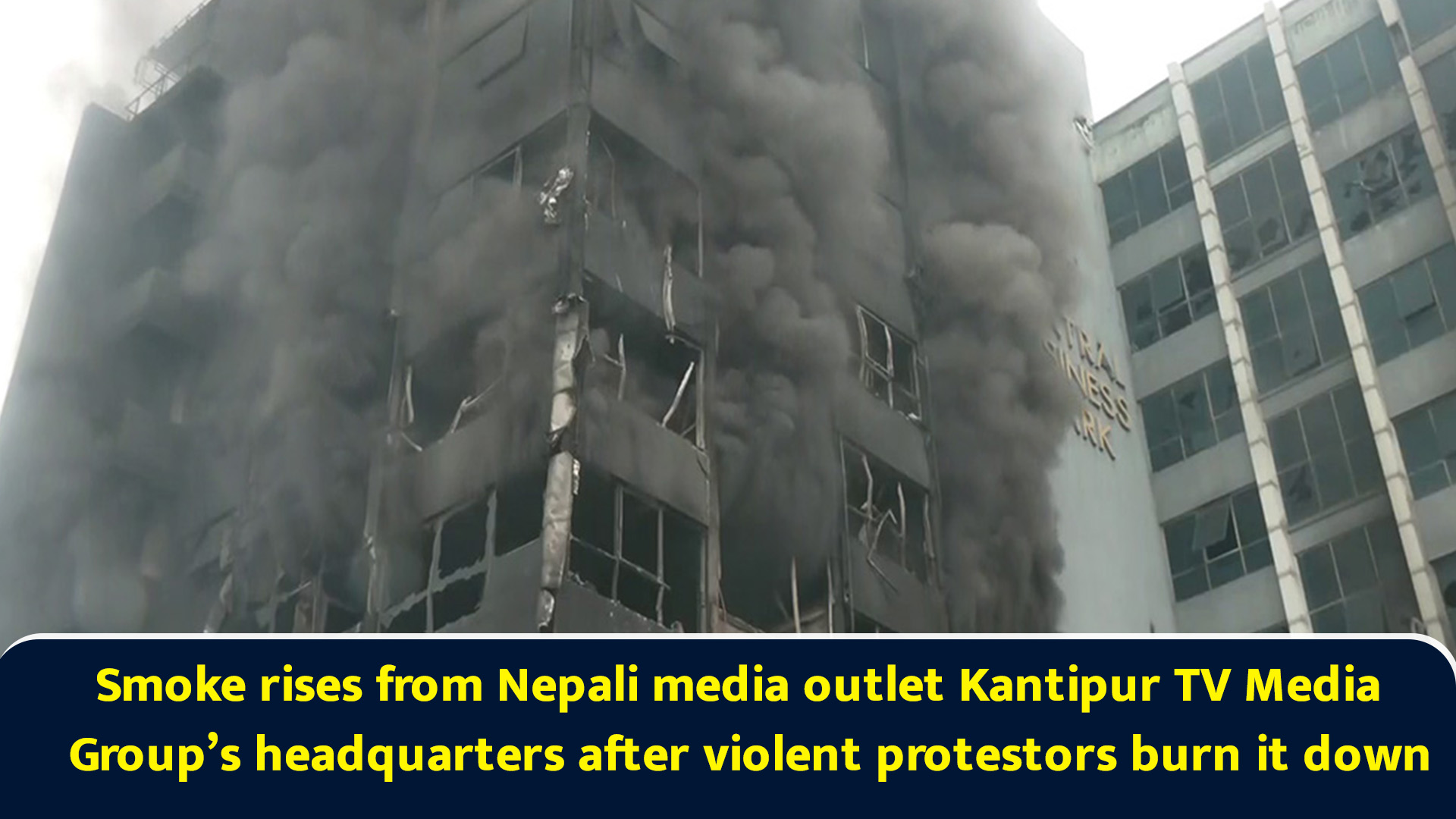 Smoke rises from Nepali media outlet Kantipur TV Media Group’s ...