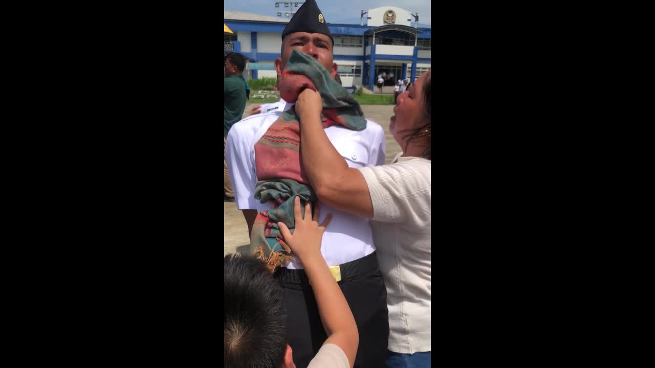 Young cadet battles to stay in formation during emotional reunion with ...