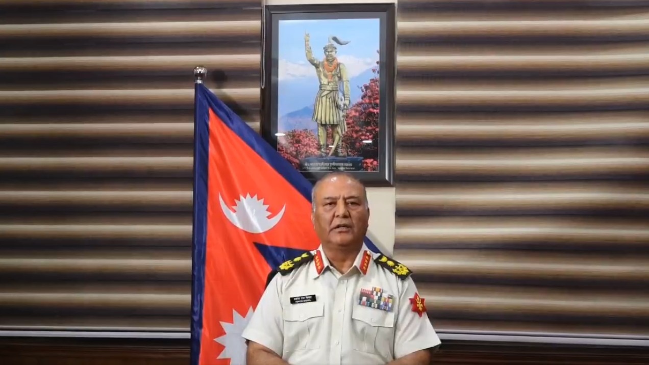 Hindu king's portrait behind Nepal Army chief. Is there a message?