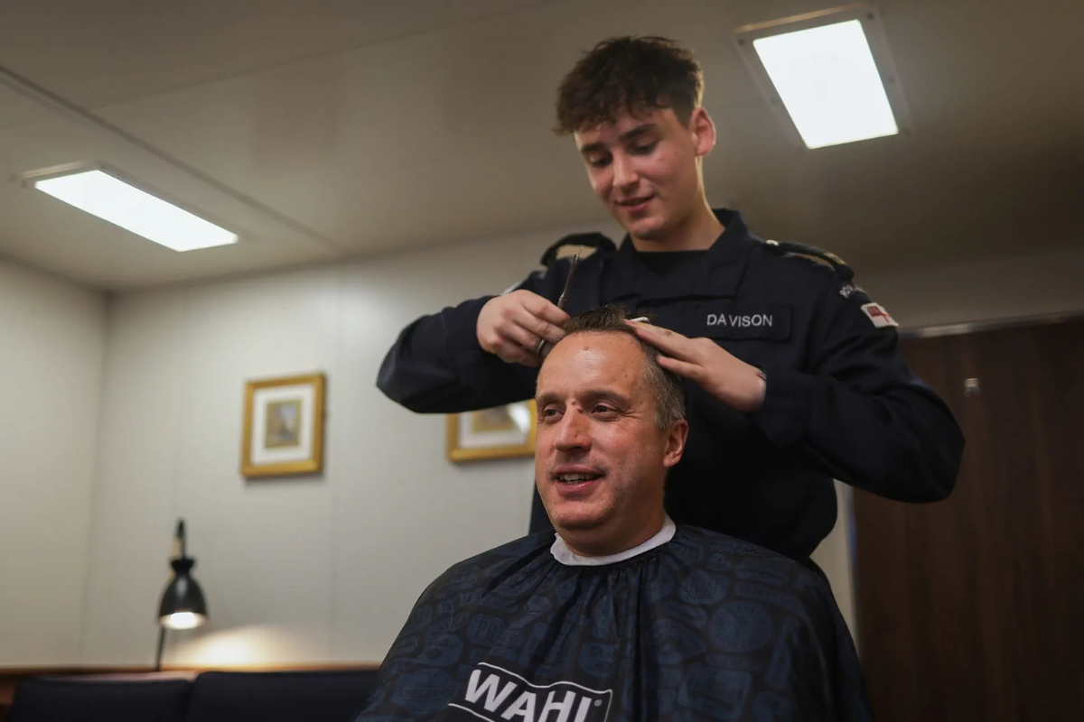 "I was cutting hair on the side - and now I'm styling 400 shipmates on ...