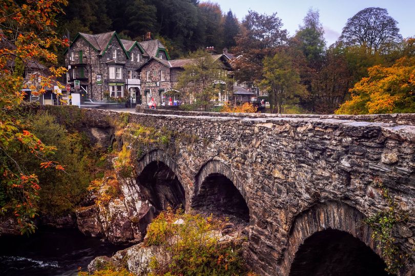 Pretty town surrounded by waterfalls and mountains feels like being in ...