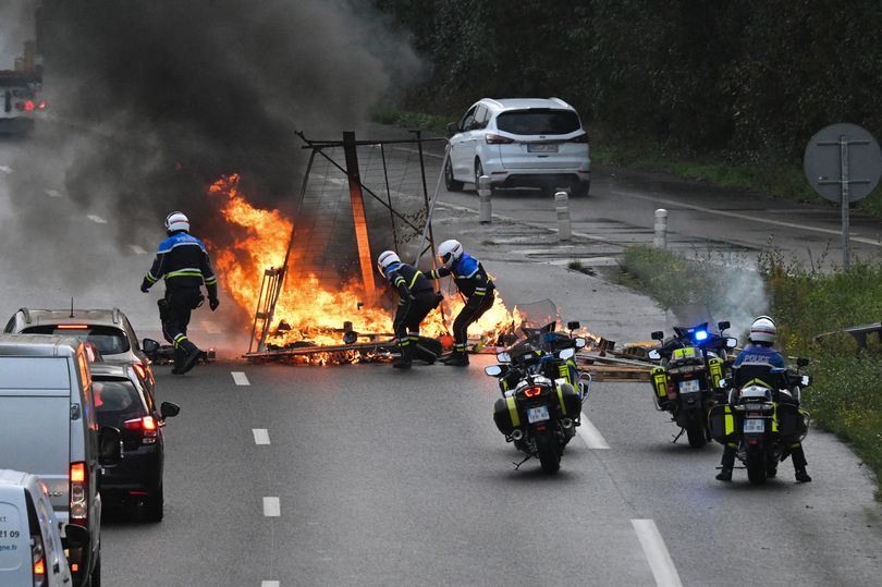 Paris riots erupt as protesters burn cars and deface landmarks across city