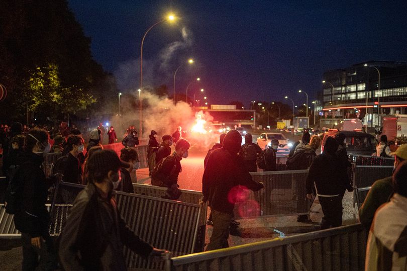 Paris riots erupt as protesters burn cars and deface landmarks across city