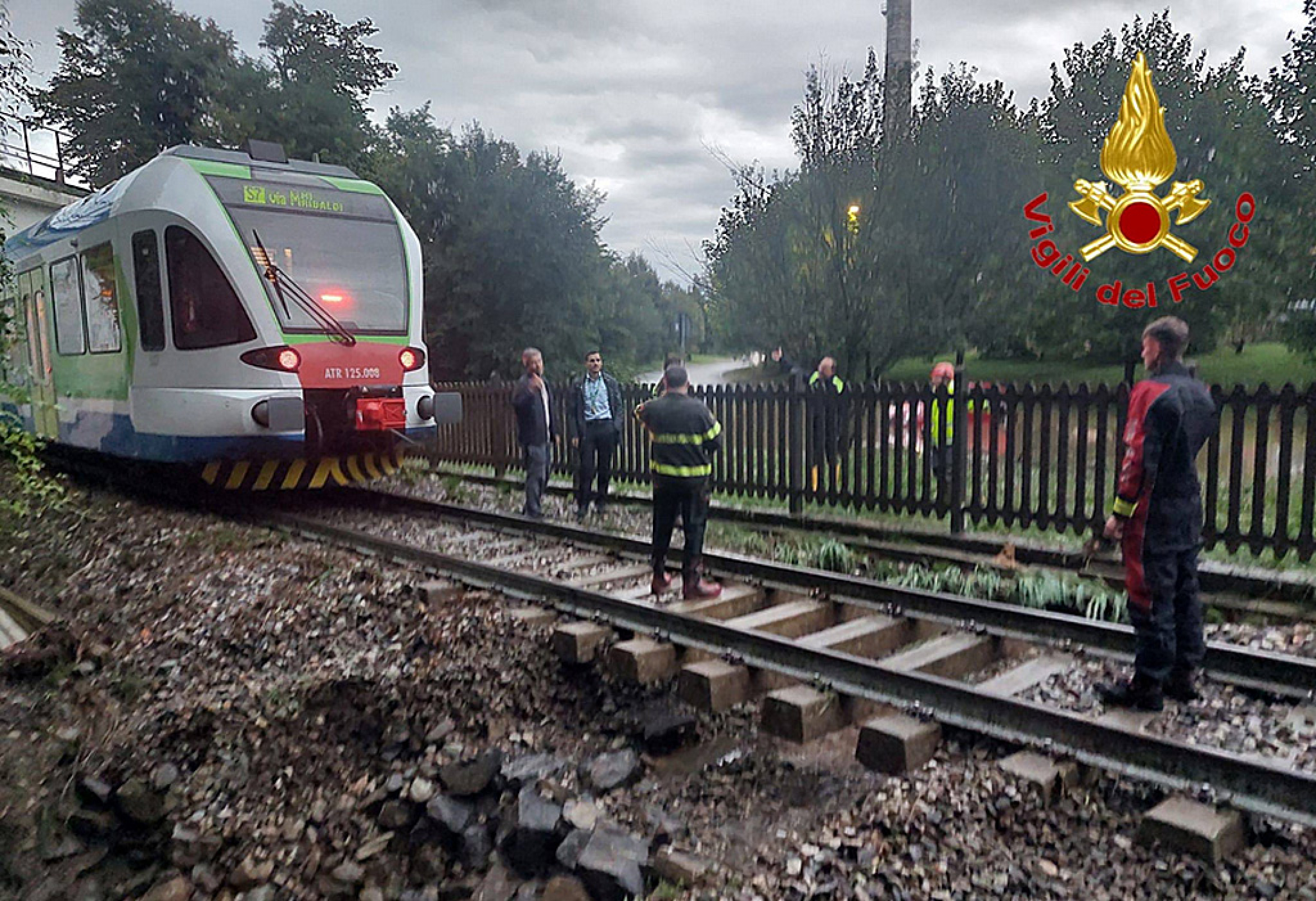 Train crash narrowly averted after storms cause sinkhole