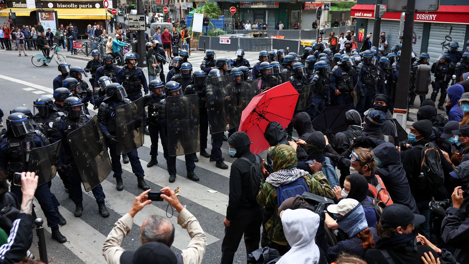 Riot police clash with protesters in France