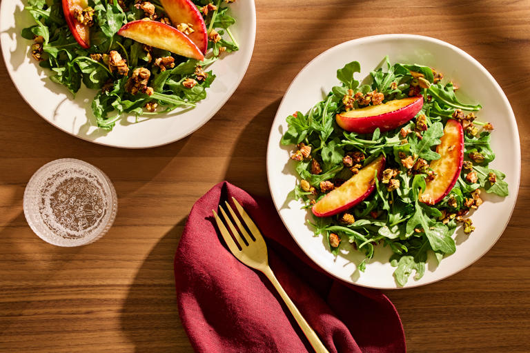 This fall arugula salad piles on sweet apples and smoky, toasted nuts