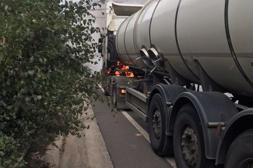 Dramatic moment milk tanker catches fire on A38